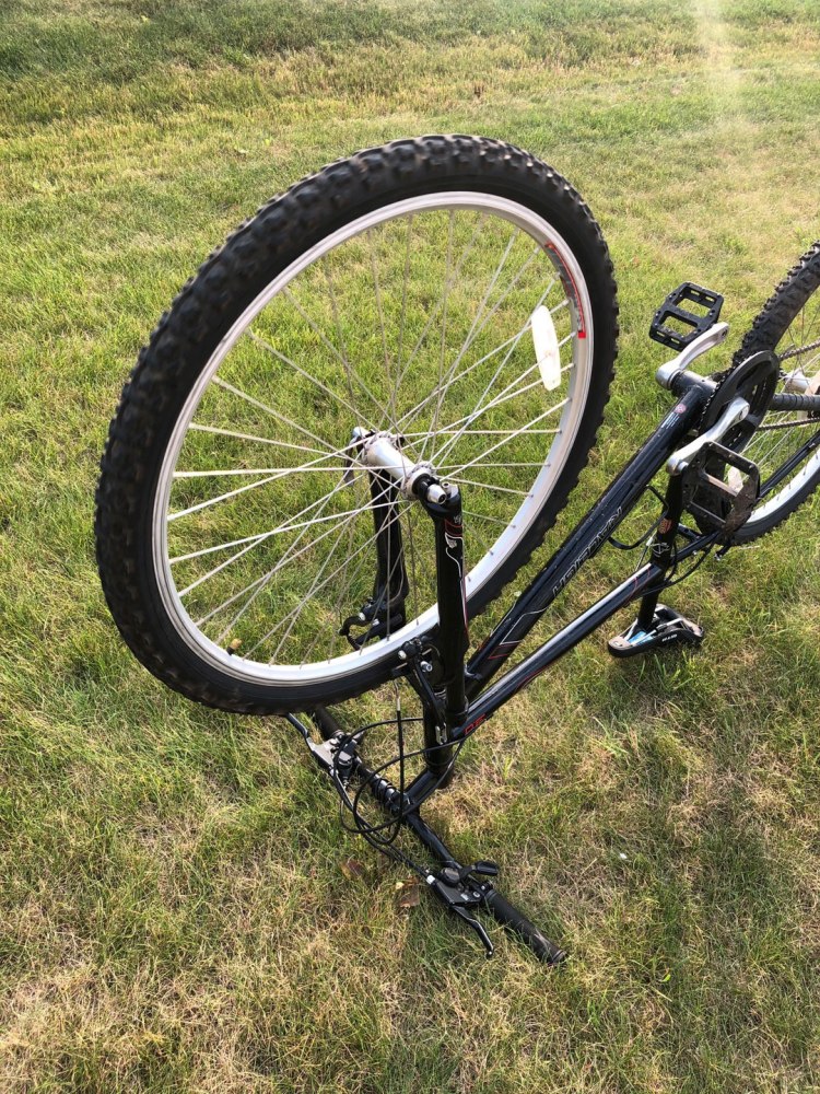 How to change a mountain bike tire with an inner tube and V-brakes ...